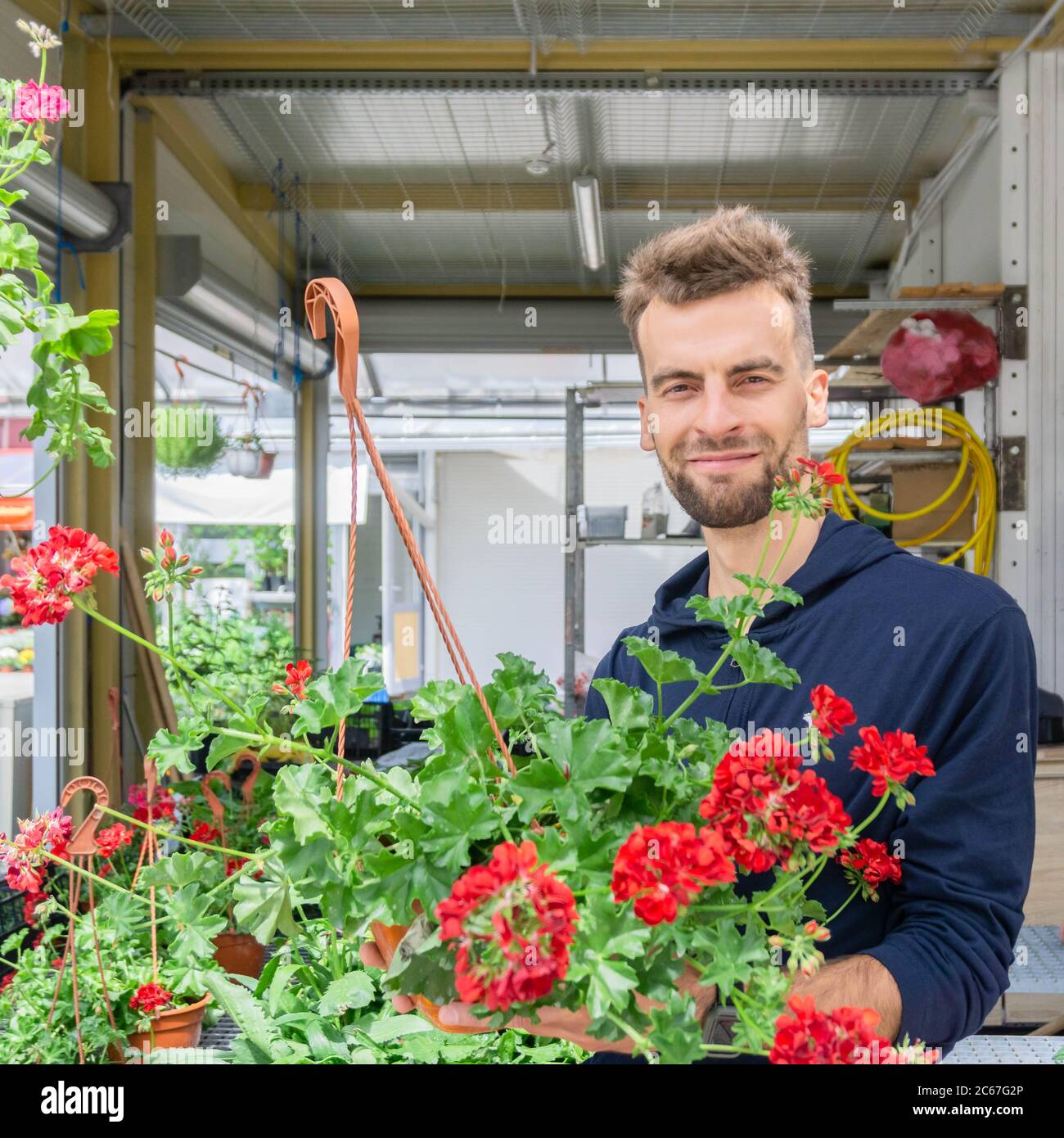 Male gardener plants open hi-res stock photography and images - Alamy