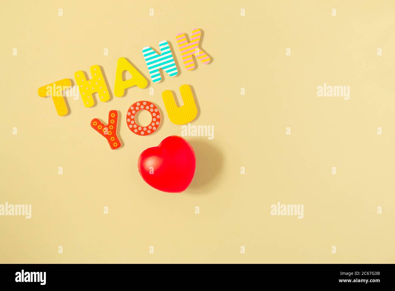 Thank you words and red heart isolated on background. Red heart and ...