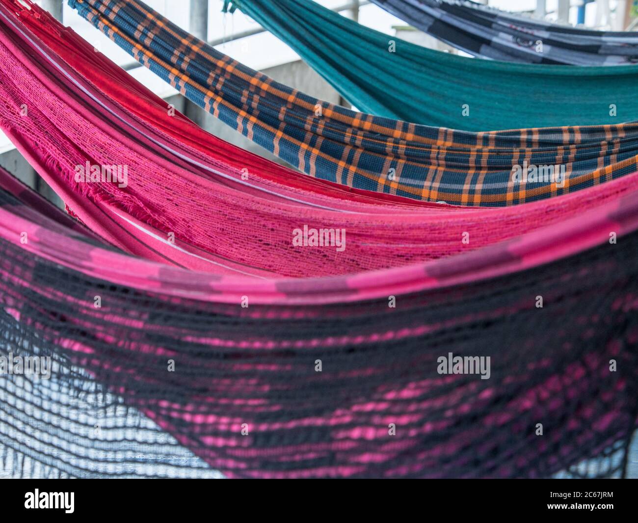 Amazon River, Peru. Beautiful, colorful hammocks on the cargo boat ...