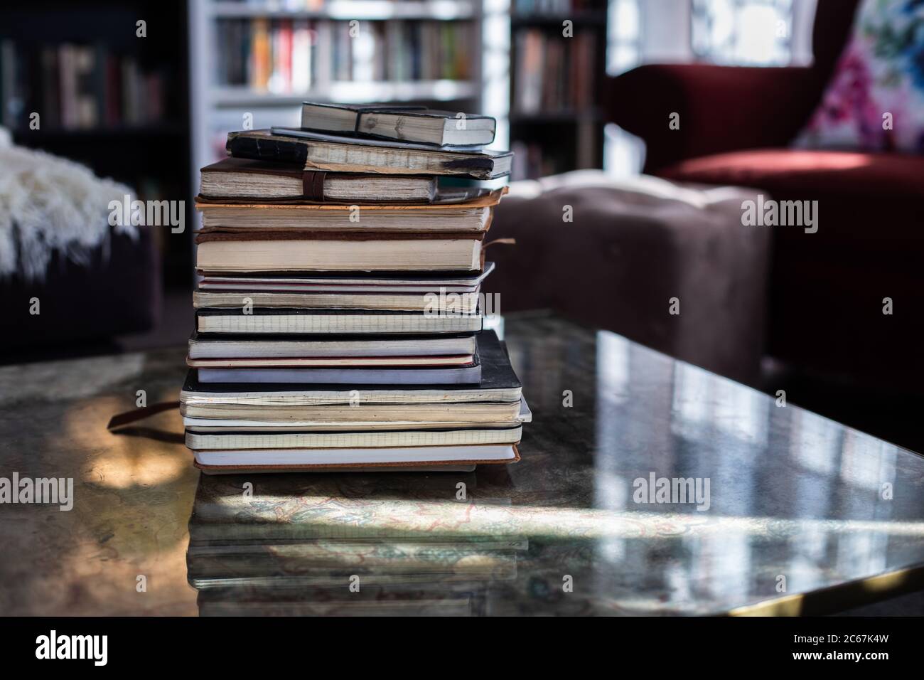 A stack of old notebooks creating a sense of history and secrets Stock ...