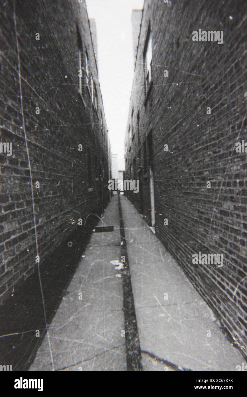 Fine 70s vintage black and white lifestyle photography of an urban back ...