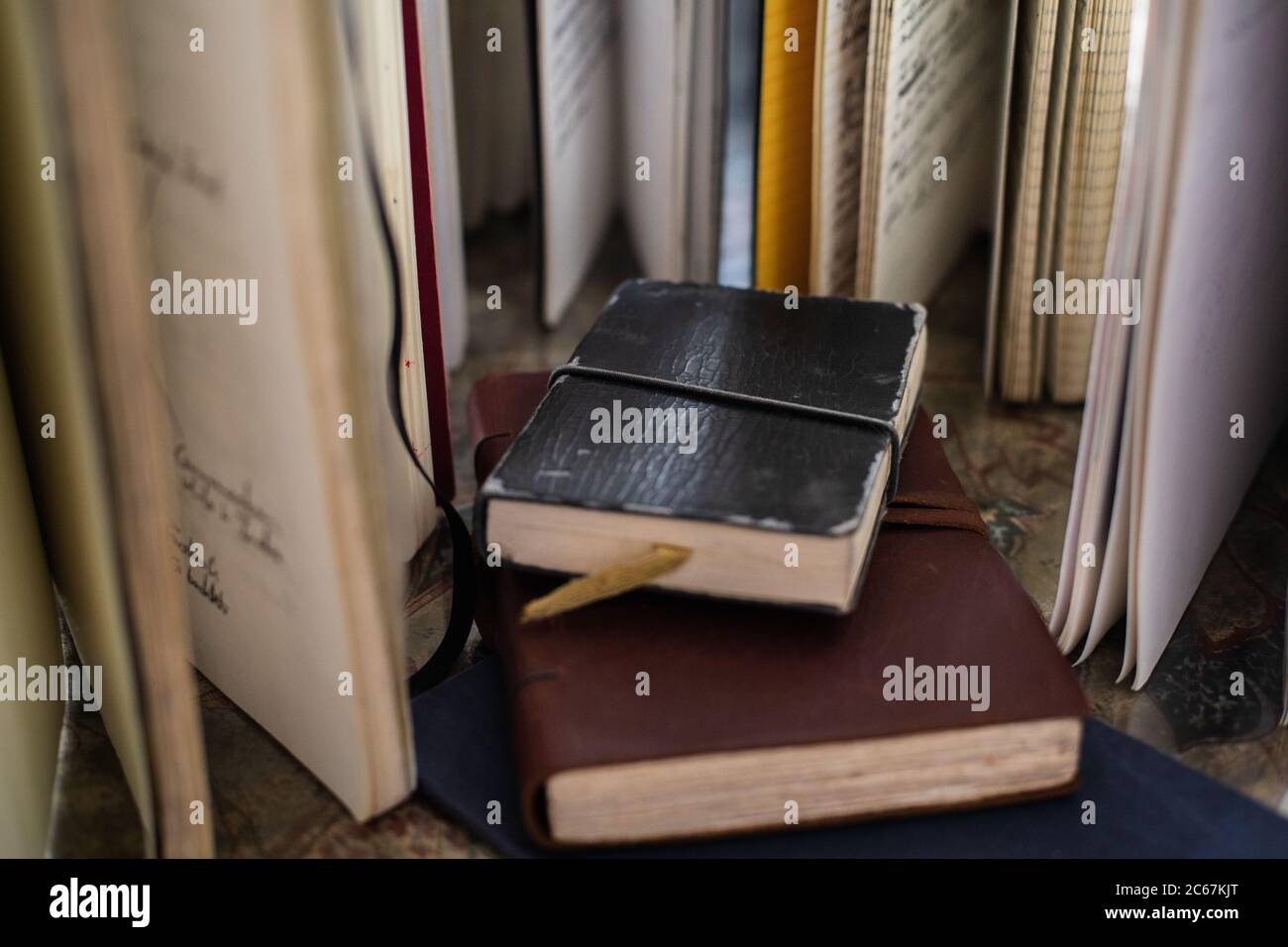 Old notebooks creating a sense of history and secrets Stock Photo - Alamy
