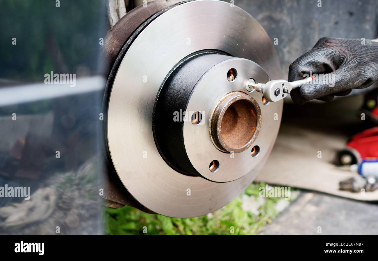 Repairing of car disc brake system Stock Photo - Alamy