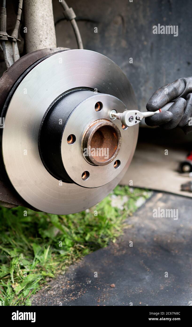 Repairing of car disc brake system Stock Photo - Alamy