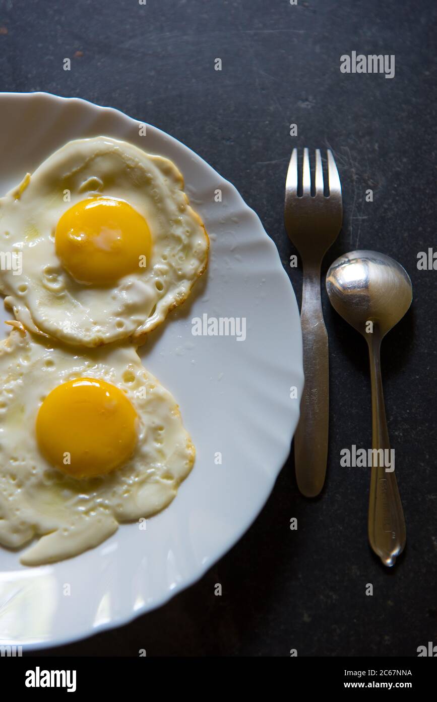 Close up of egg poaches with use of selective focus Stock Photo - Alamy