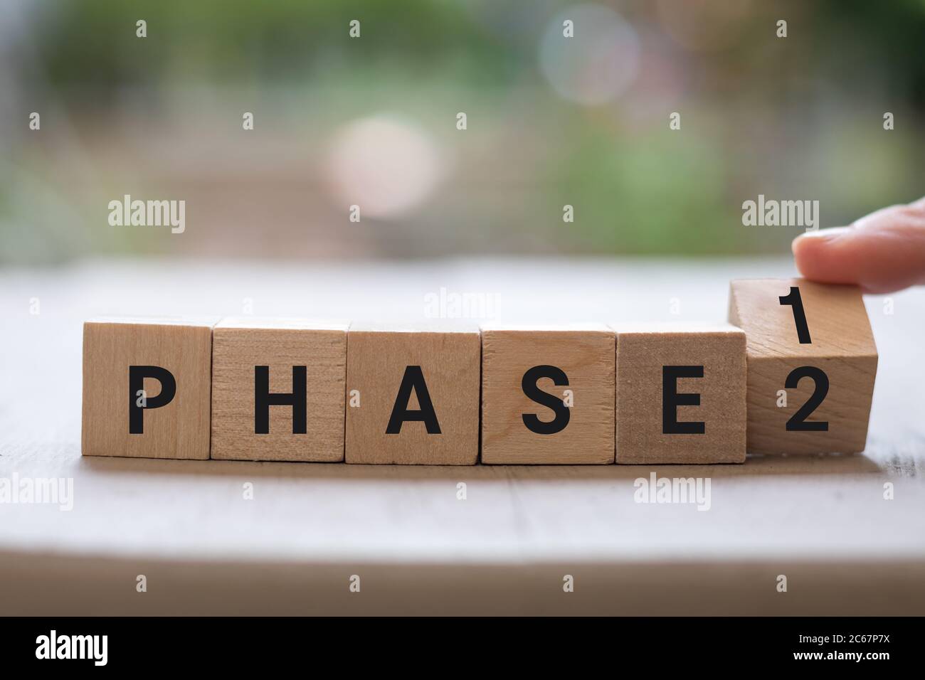 PHASE 1 2 reopen project plan concept on wood blocks as finger changes ...