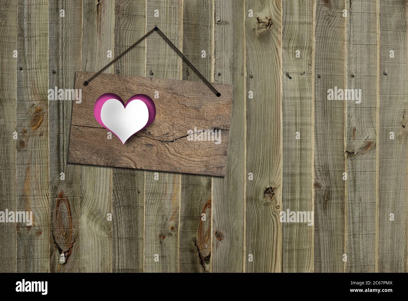 Antique rustic wooden sign board with paper heart hanging on old ...