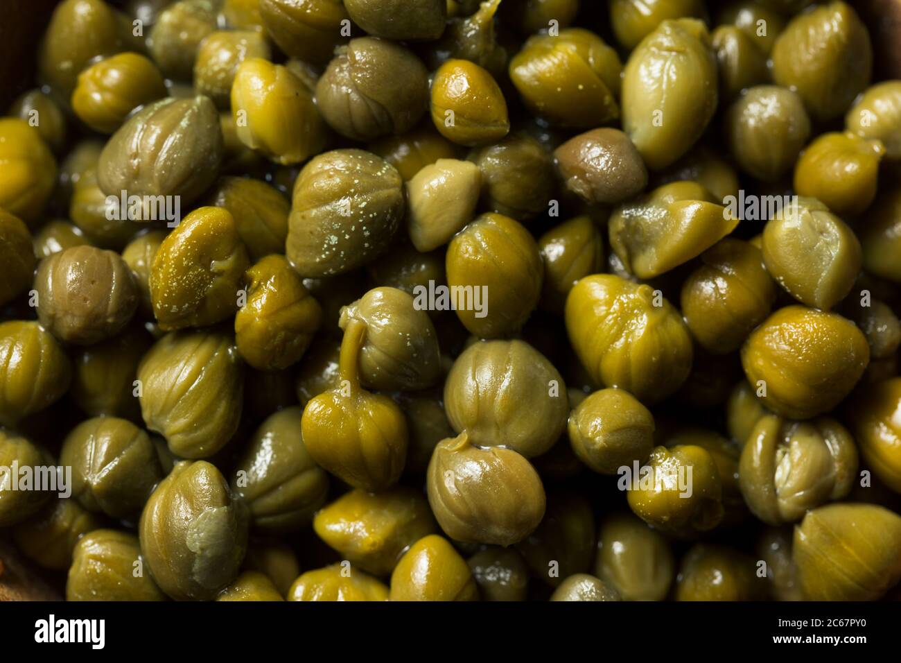 Organic Pickled Canned Capers in a Bowl Stock Photo - Alamy
