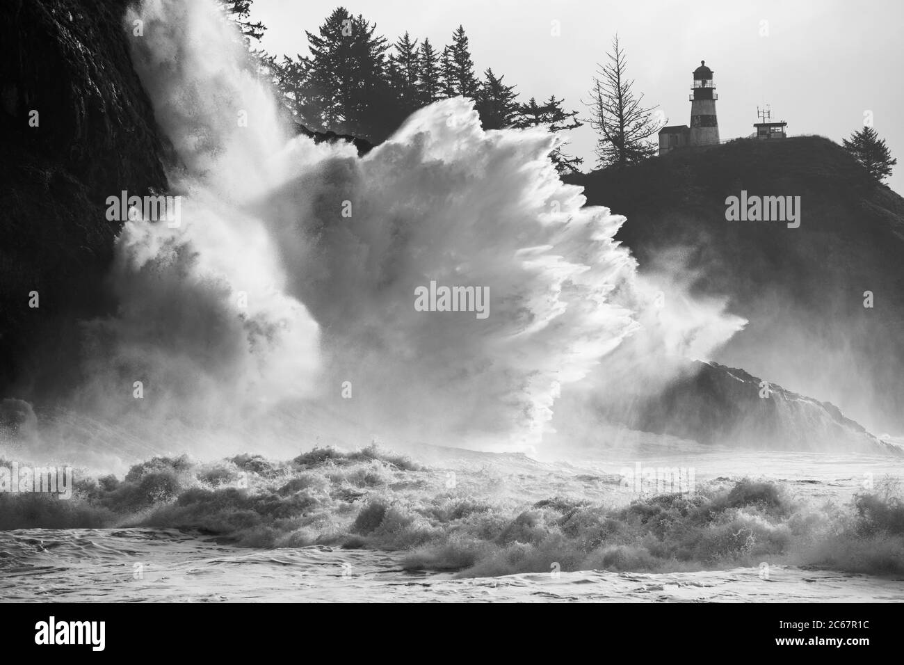 Wave crashing over cliff, Cape Disappointment, Oregon, USA Stock Photo ...