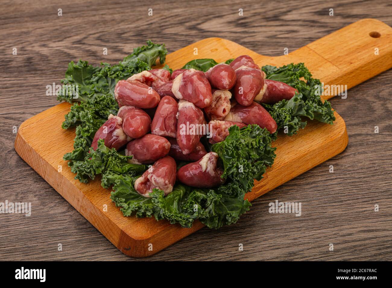 Raw chicken hearts heap for cooking Stock Photo - Alamy