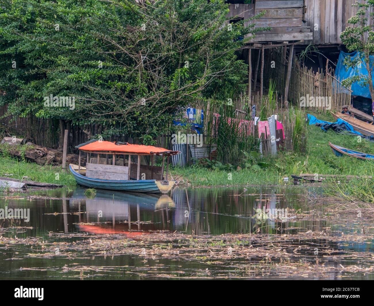 Pebas, Peru - December 04 , 2018: View of village on the bank of the ...