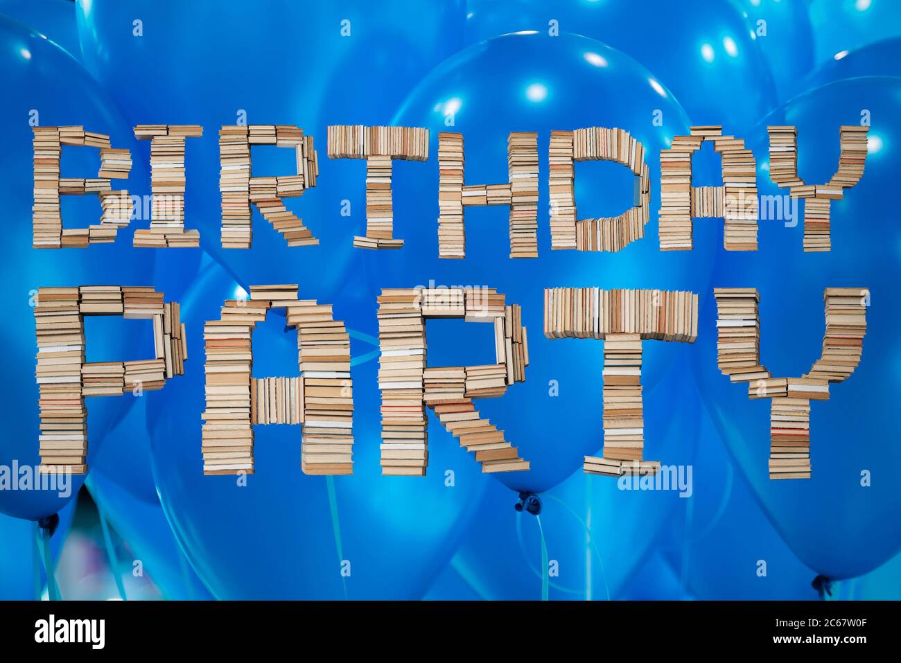 Birthday party text on inflatable balloons background. Playful birthday ...