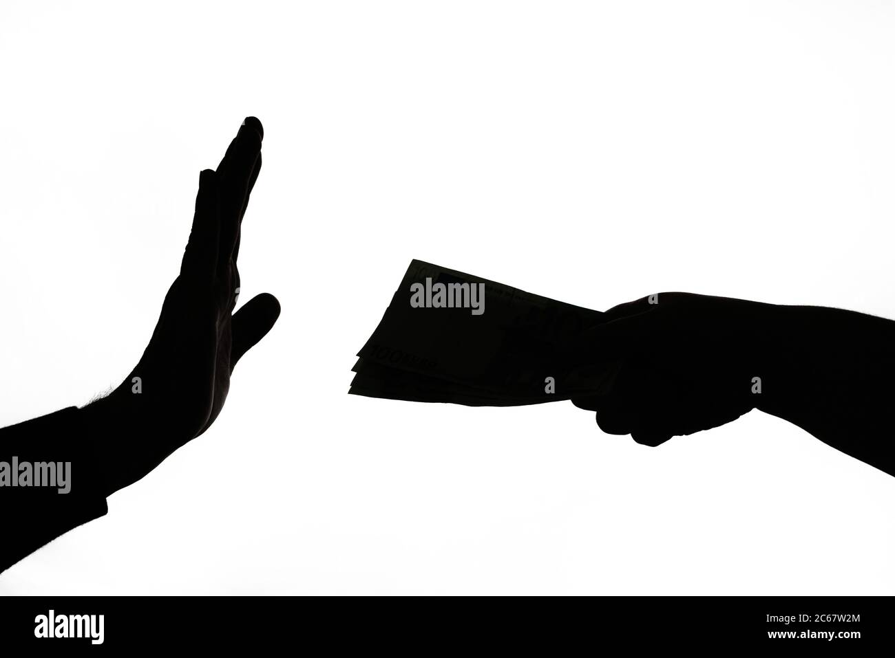 Silhouette of business man hands giving bribe isolated on gray ...
