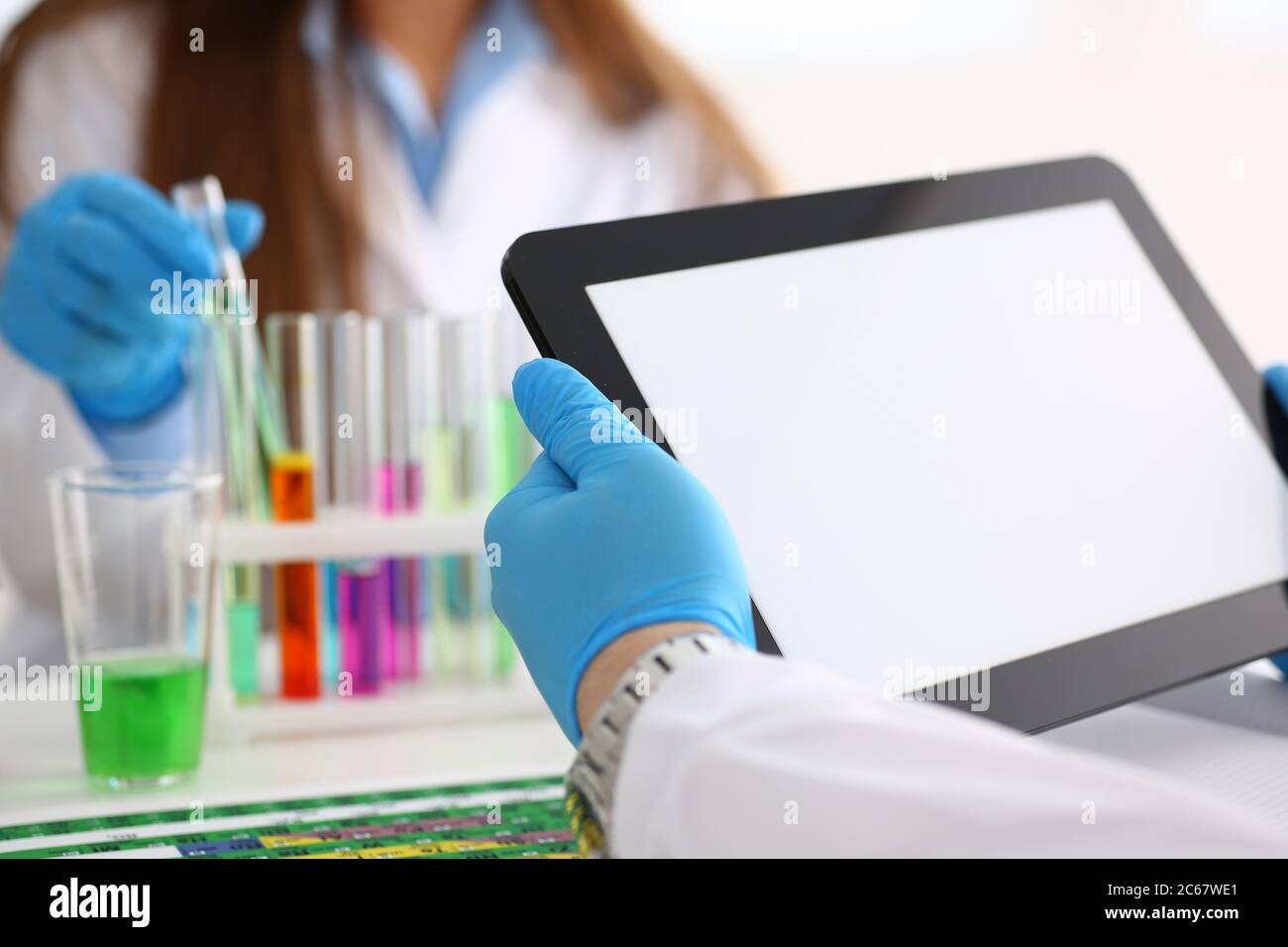 Scientists are conducting experiments in the laboratory Stock Photo - Alamy