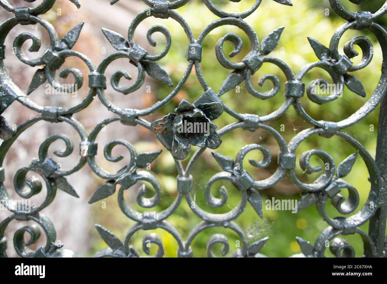 welded iron metallic design flower detail closeup garden fence Stock ...