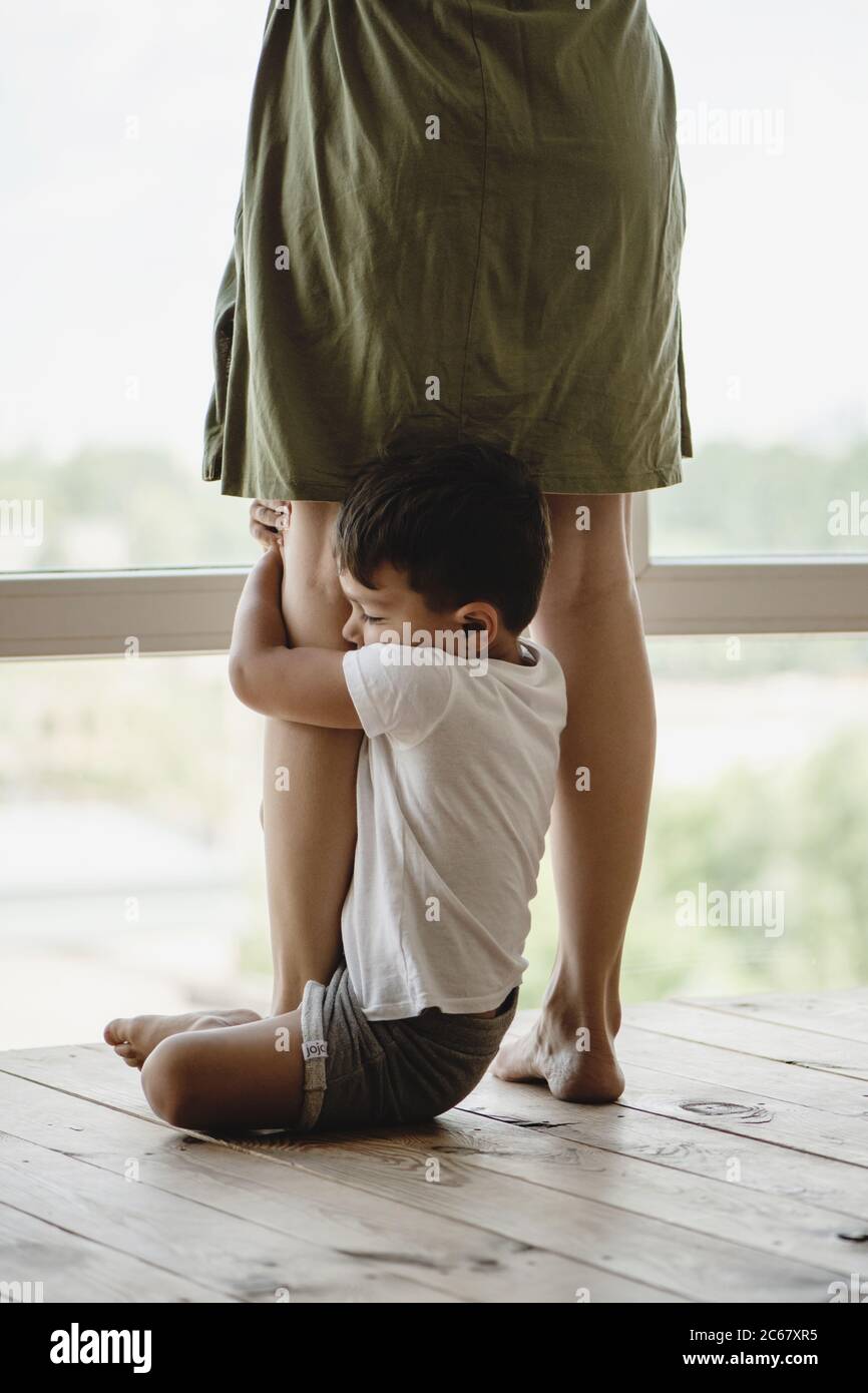 Child hugging leg hi-res stock photography and images - Alamy
