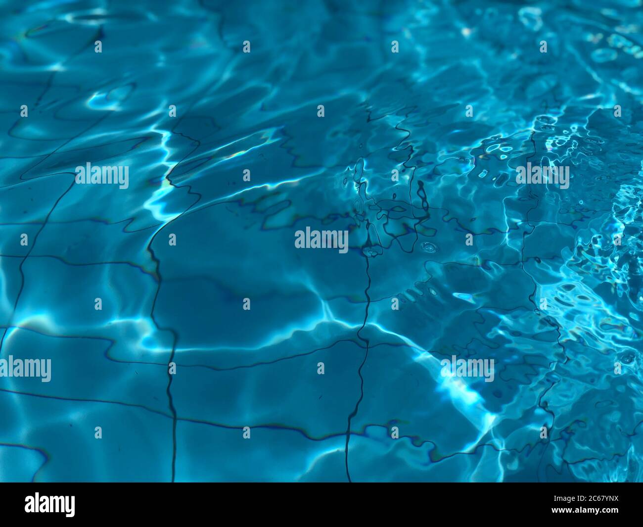 Blue pool water with sun reflections.Abstract background of water Stock ...