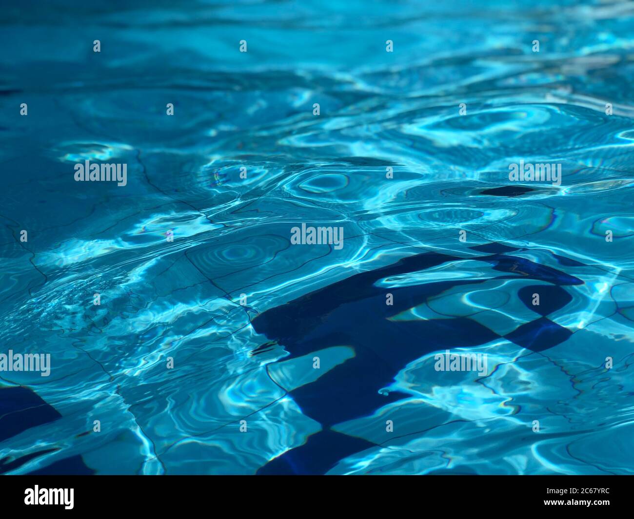 Blue pool water with sun reflections.Abstract background of water Stock ...