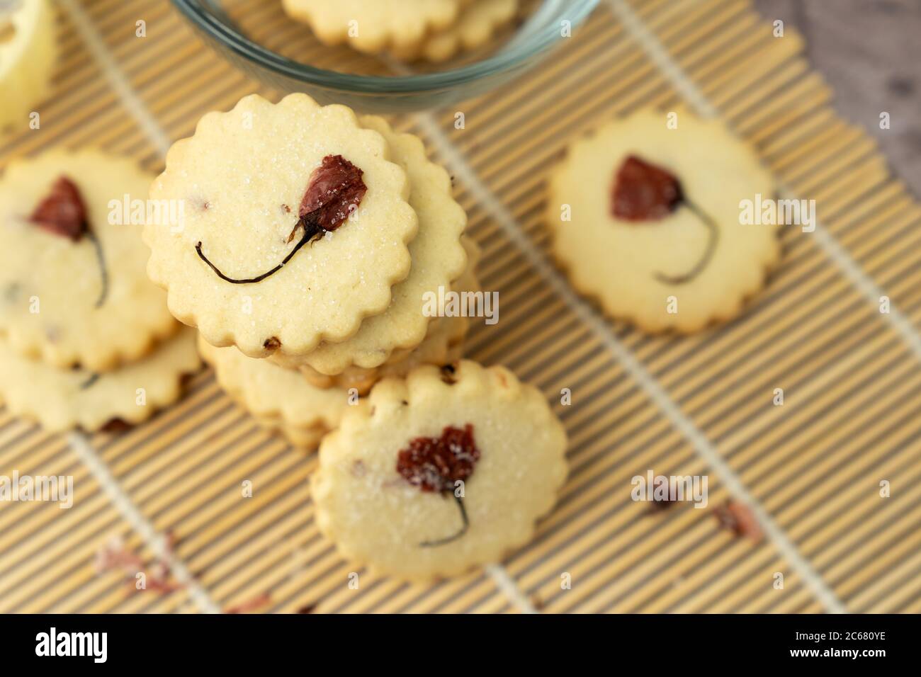 Sakura cookies with salted cherry blossom flower Stock Photo - Alamy