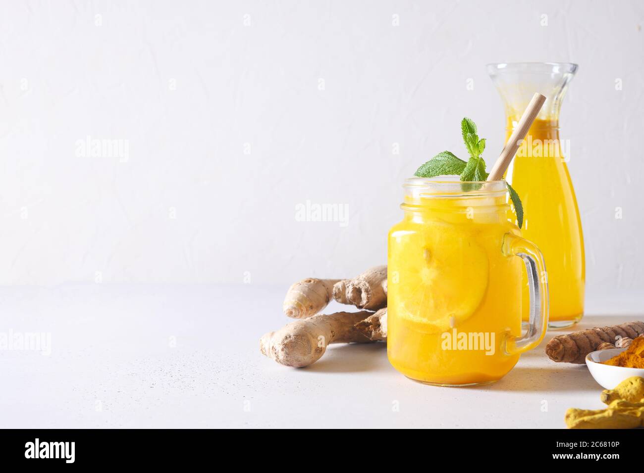 Indonesian herbal beverage Jamu with turmeric, ginger, lemon Stock ...