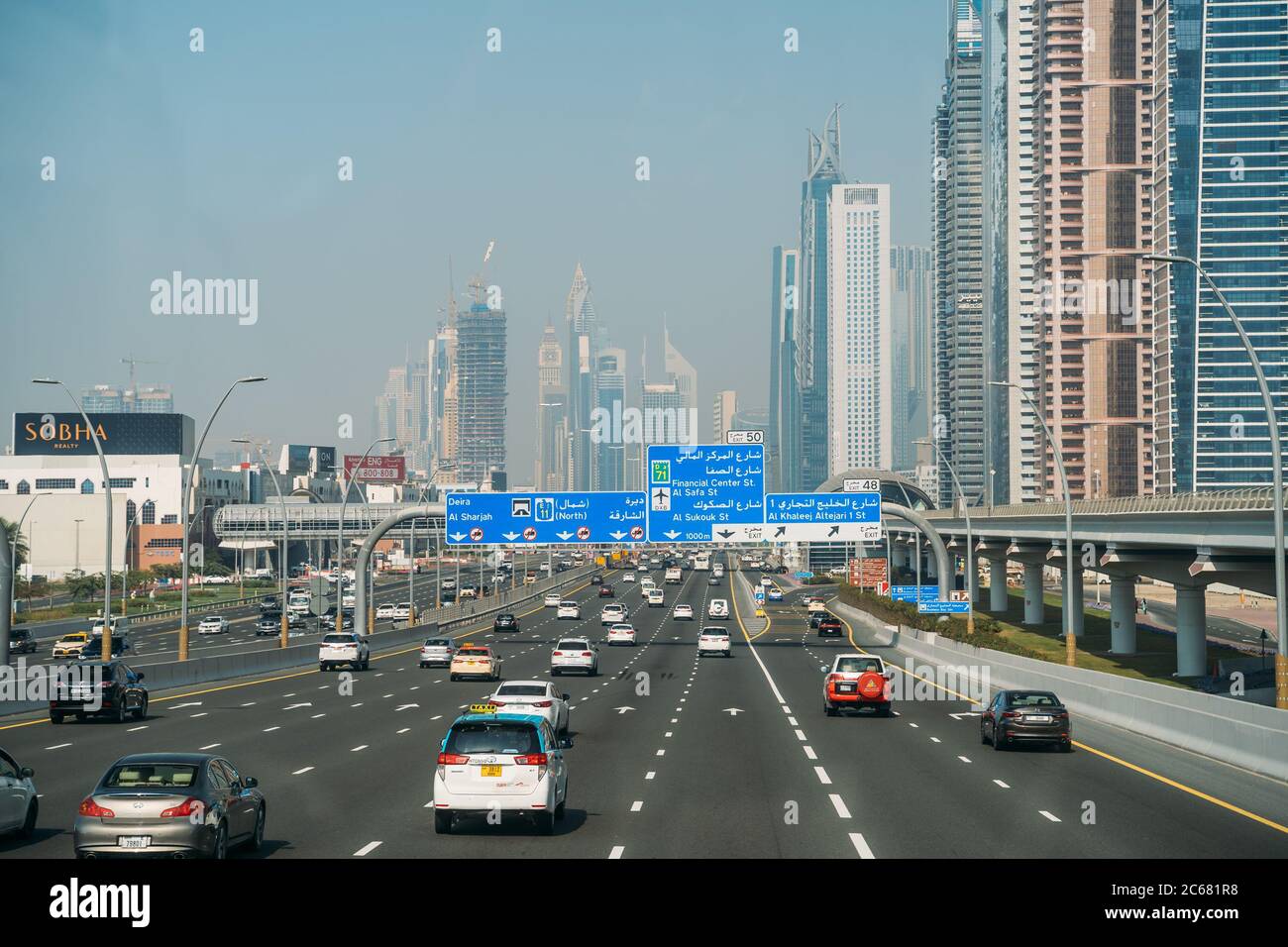 DUBAI, UAE - February 2020: Traffic on Dubai road with many cars ...