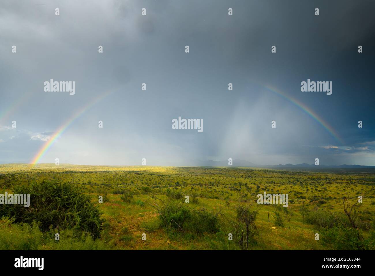 Rainbow in Namibia Stock Photo - Alamy