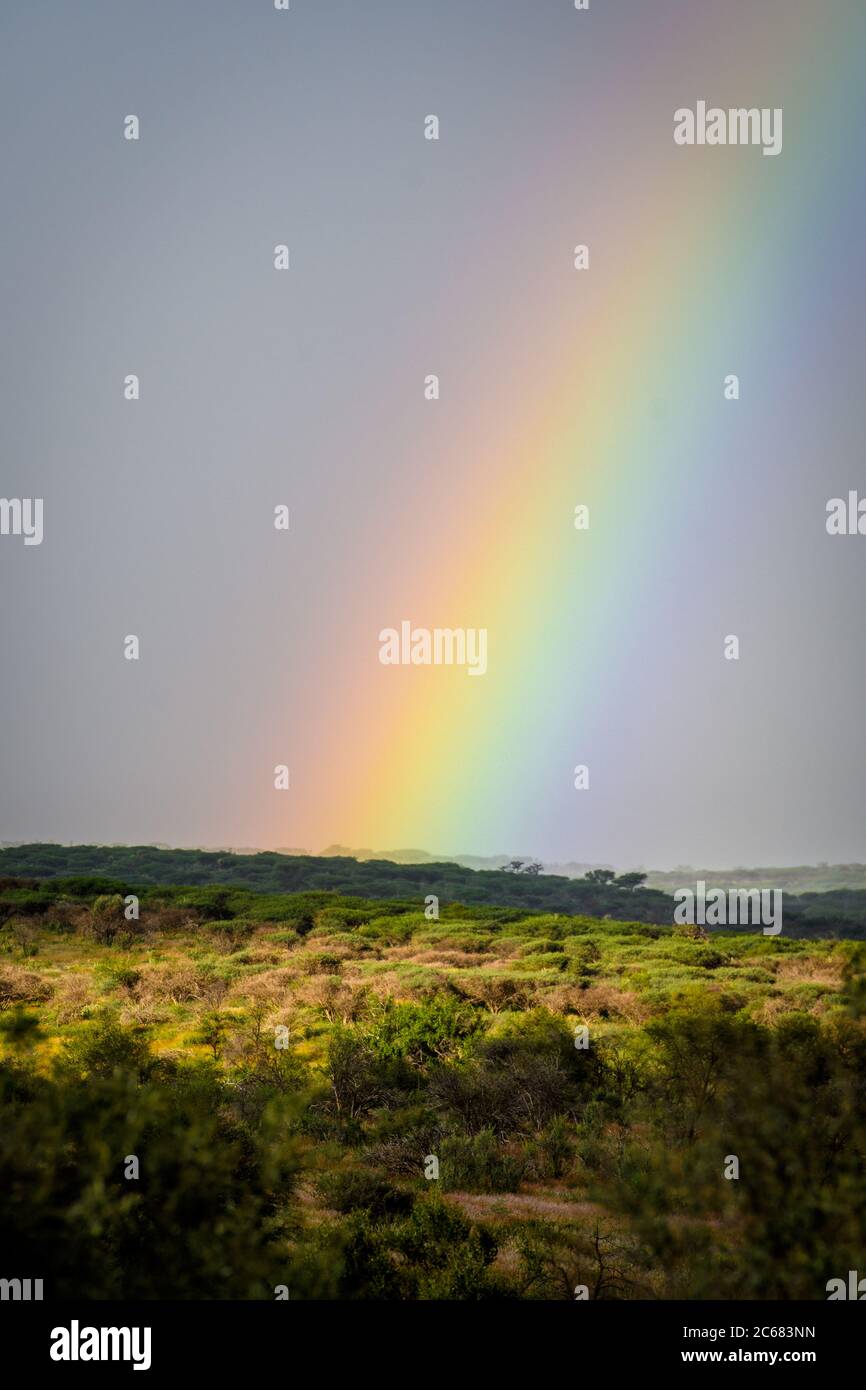 Rainbow in Namibia Stock Photo - Alamy