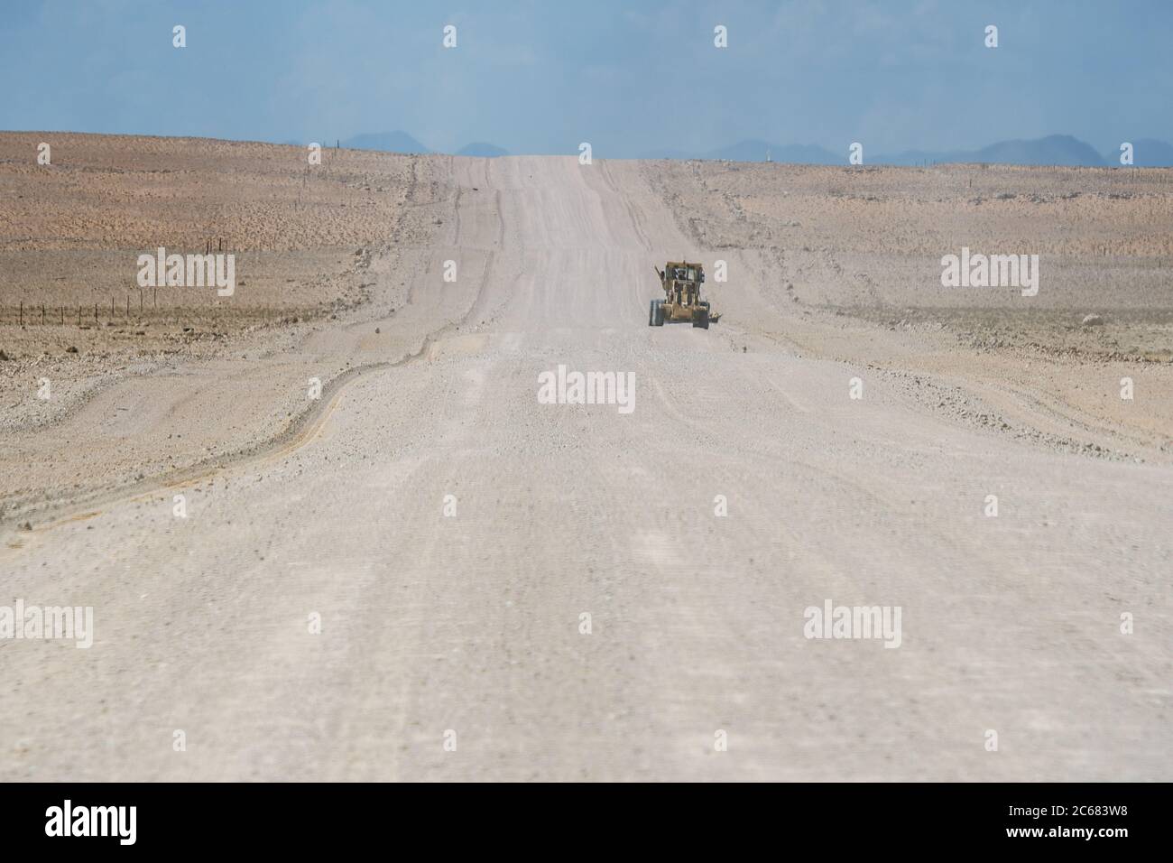 Driving down desert road in hi-res stock photography and images - Alamy