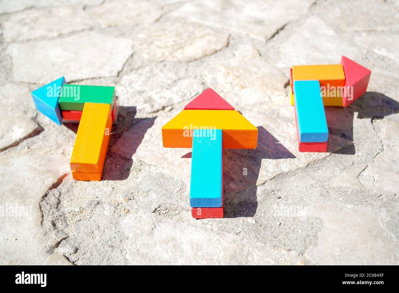 Detail of some arrows with a stone wall background Stock Photo - Alamy