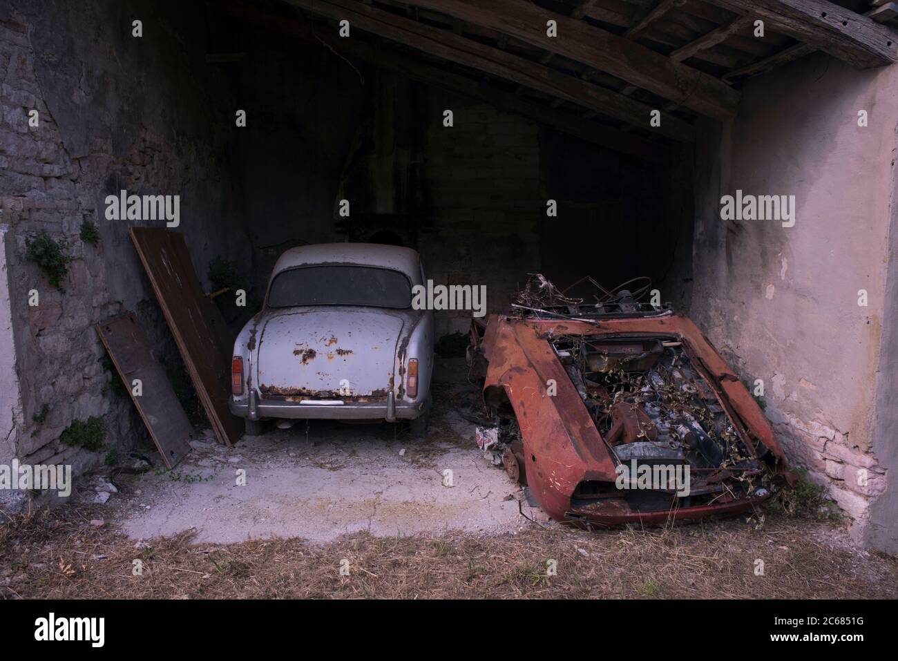 Abandoned cars that have been left to rust over the years,Italy Stock ...