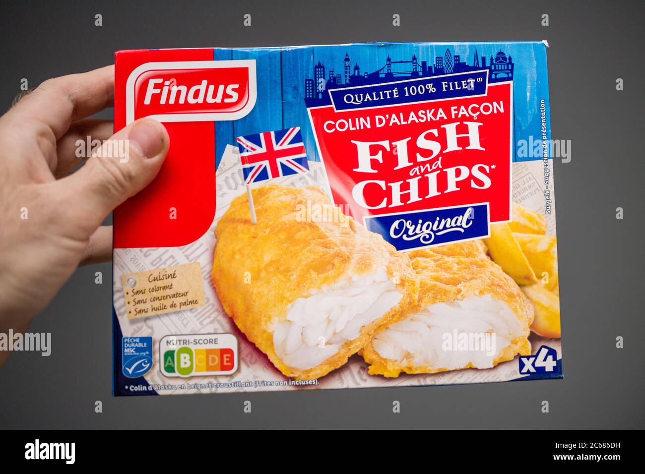 Paris, France - Apr 27, 2020: POV male hand holding package with fresh ...