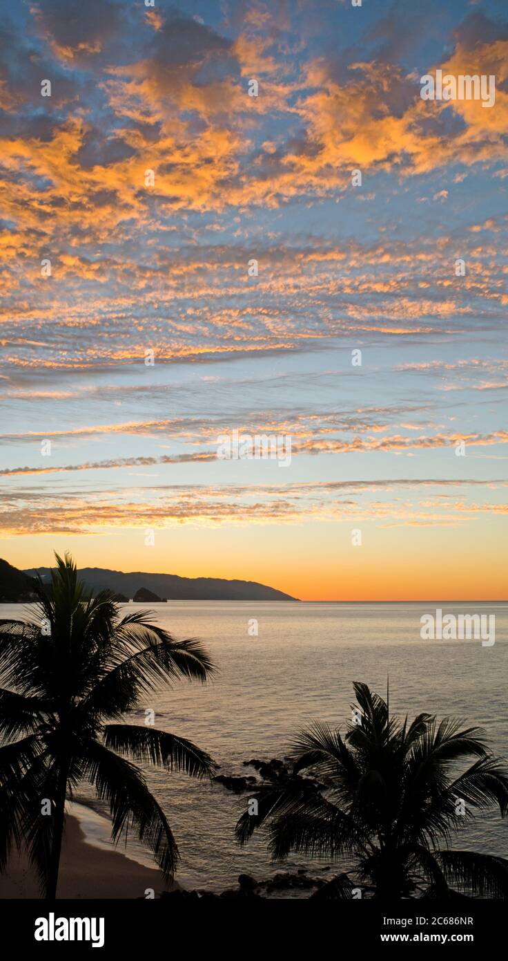 View of sunset over Punta Negra Beach, Puerto Vallarta, Jalisco, Mexico ...