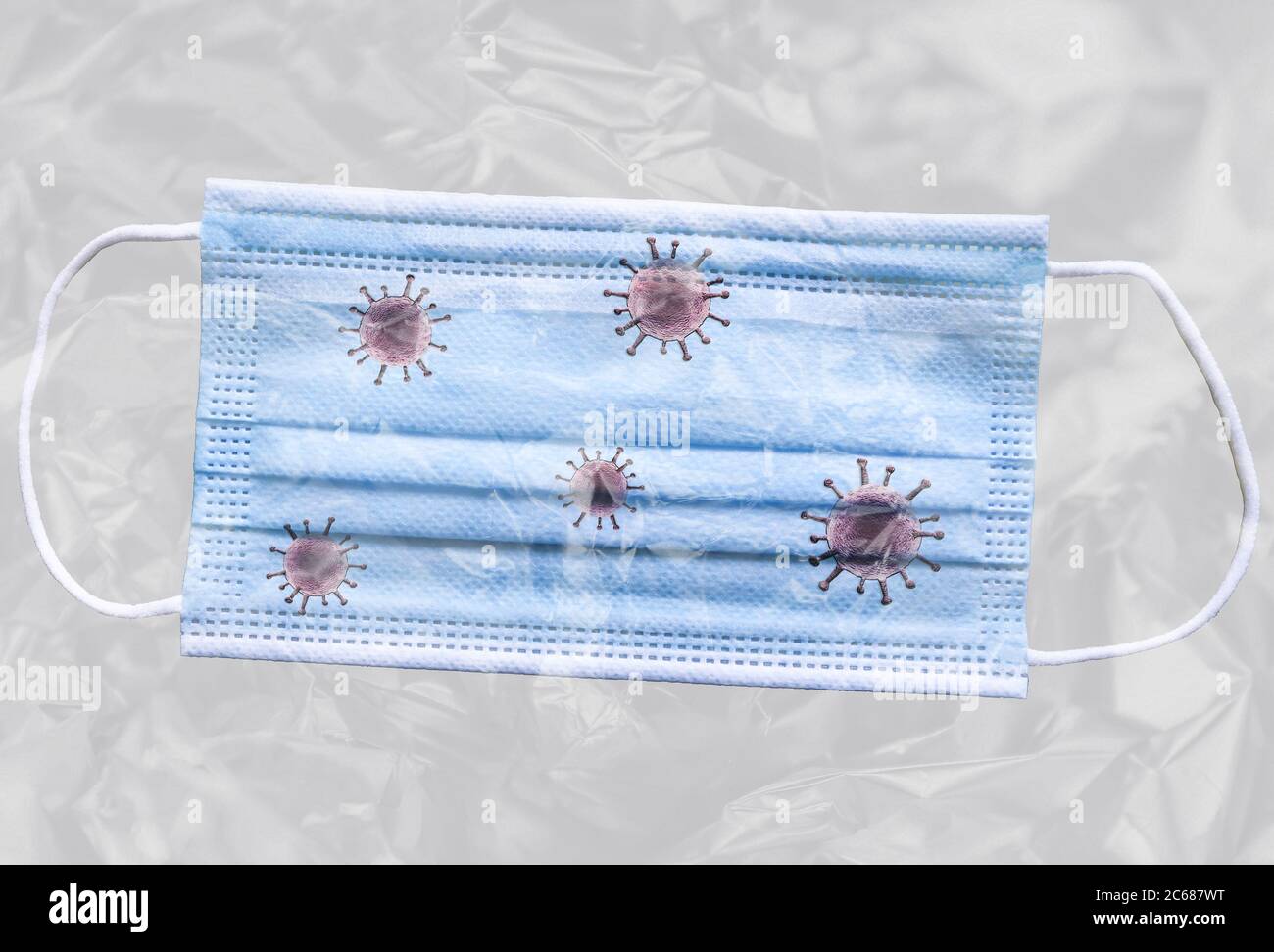 Medical corona virus mask behind plastic film with corona virus on and ...