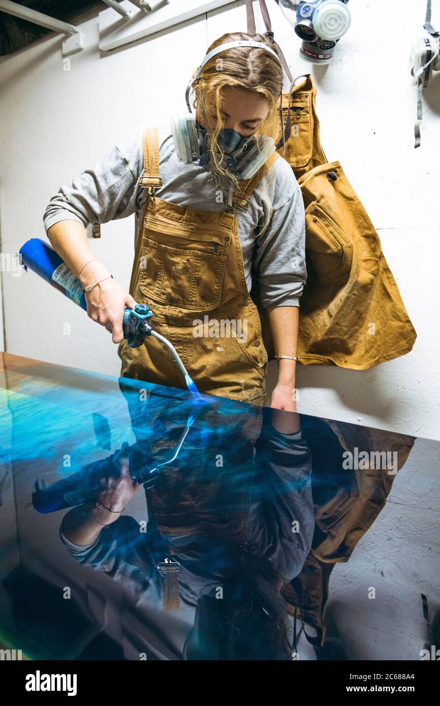 Woman blowtorch hi-res stock photography and images - Alamy