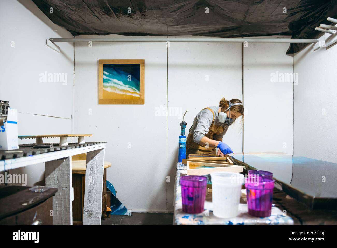 Female resin working in homemade studio Stock Photo - Alamy