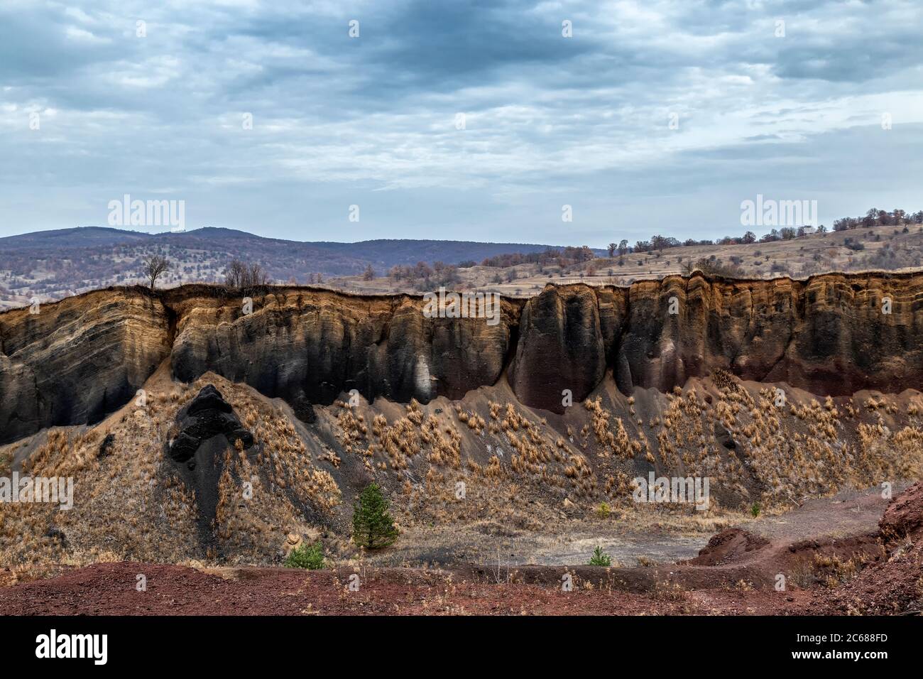 Red slag RacoÈ™ Volcano in Romania Stock Photo - Alamy