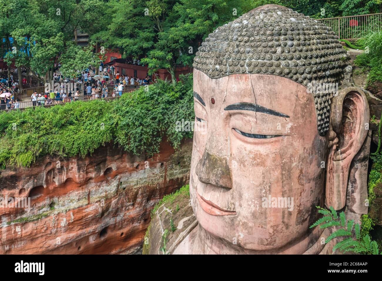 Leshan, China - July 2019 : The close up of the head and torso of the ...