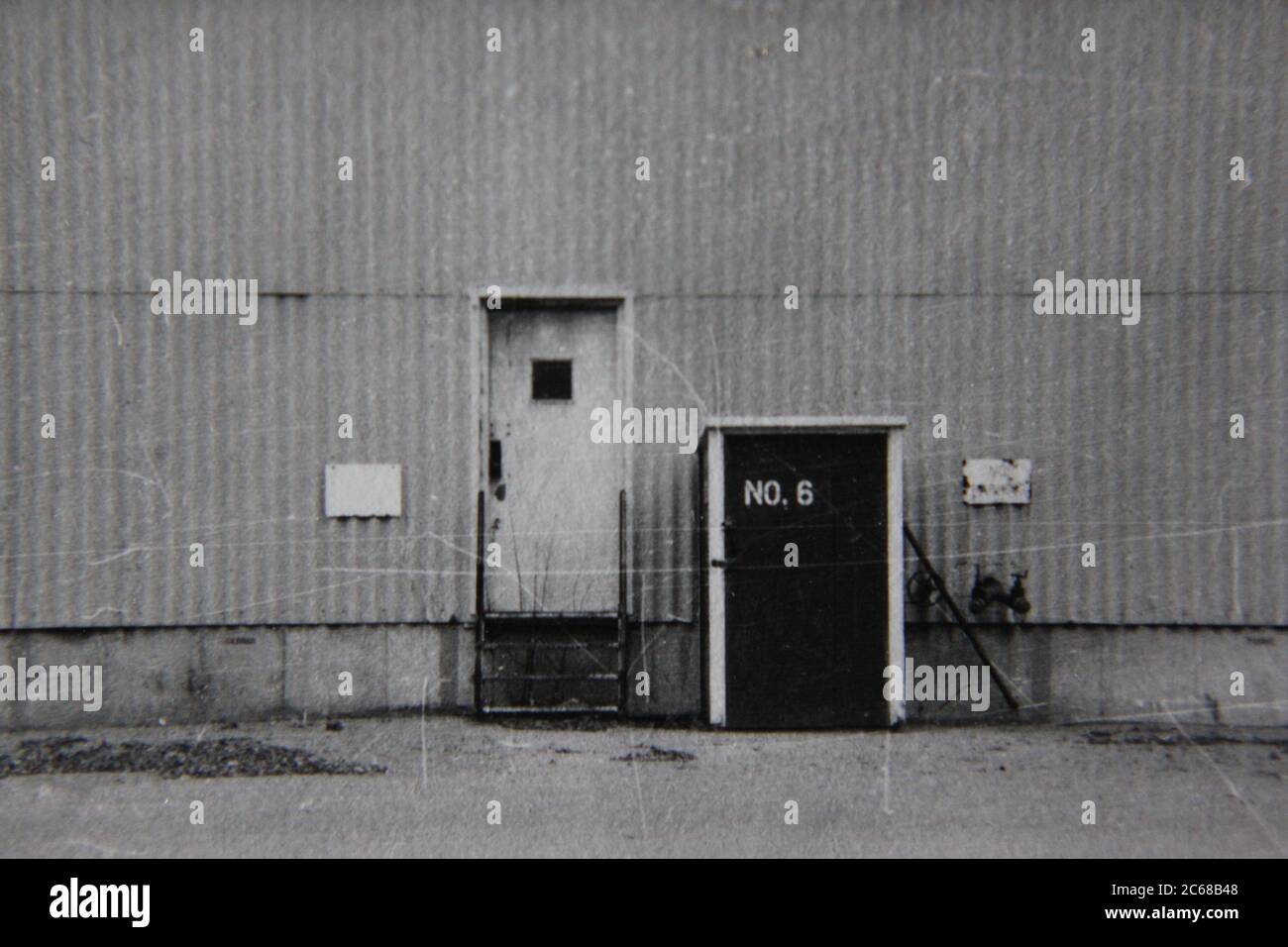 Fine 70s vintage black and white lifestyle photography of a back alley ...