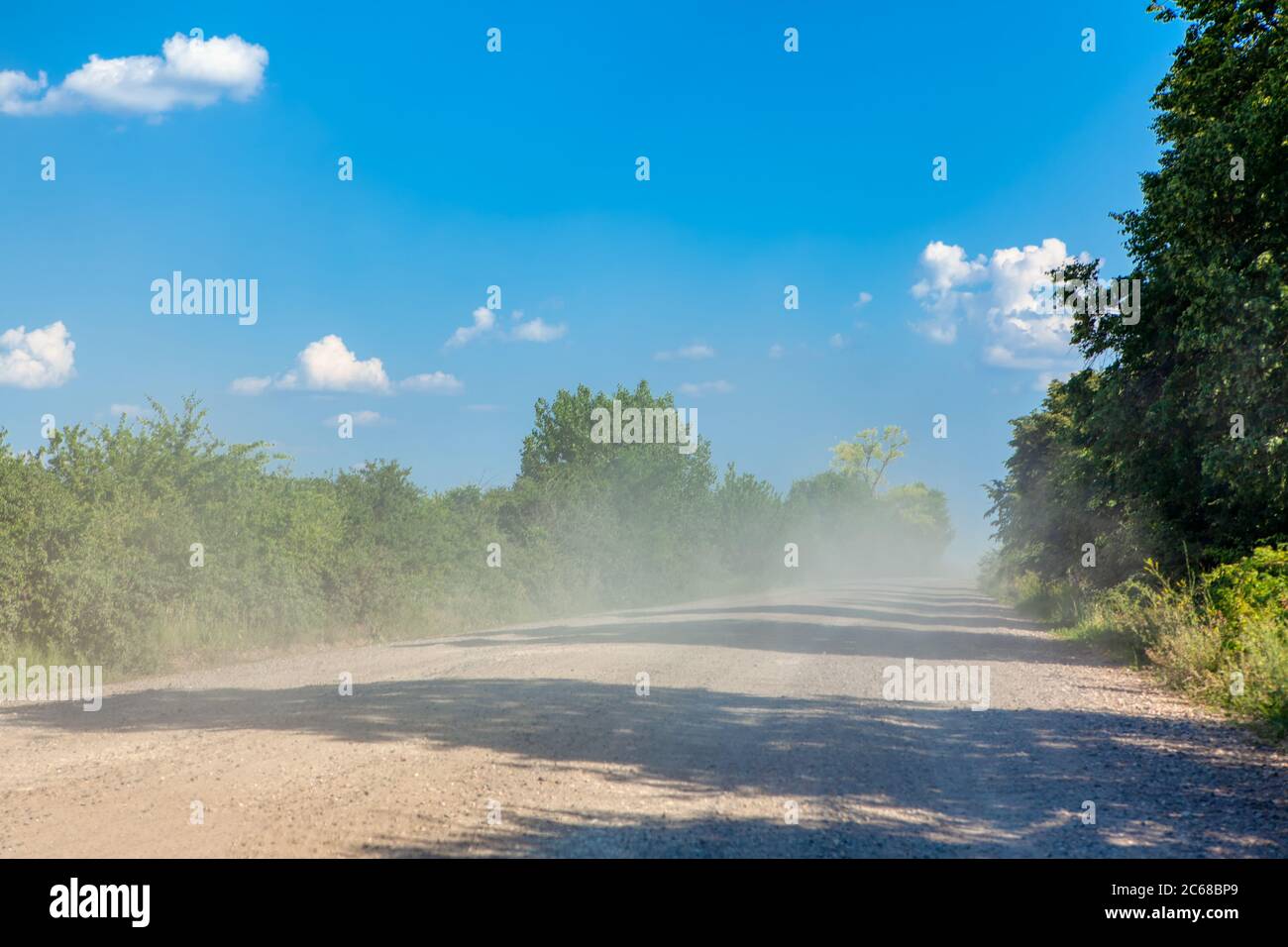 dusty country road in the summer Stock Photo - Alamy