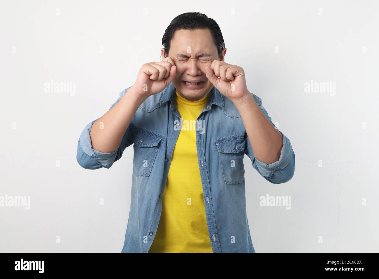 Attractive guy crying hi-res stock photography and images - Alamy