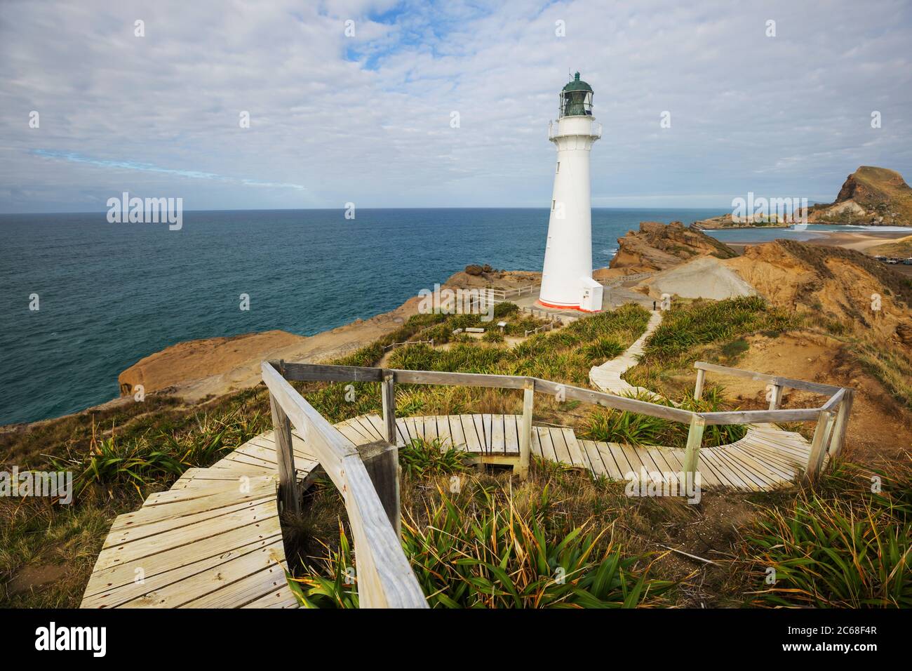 Lighthouse in Pacific coast, New Zealand Stock Photo - Alamy