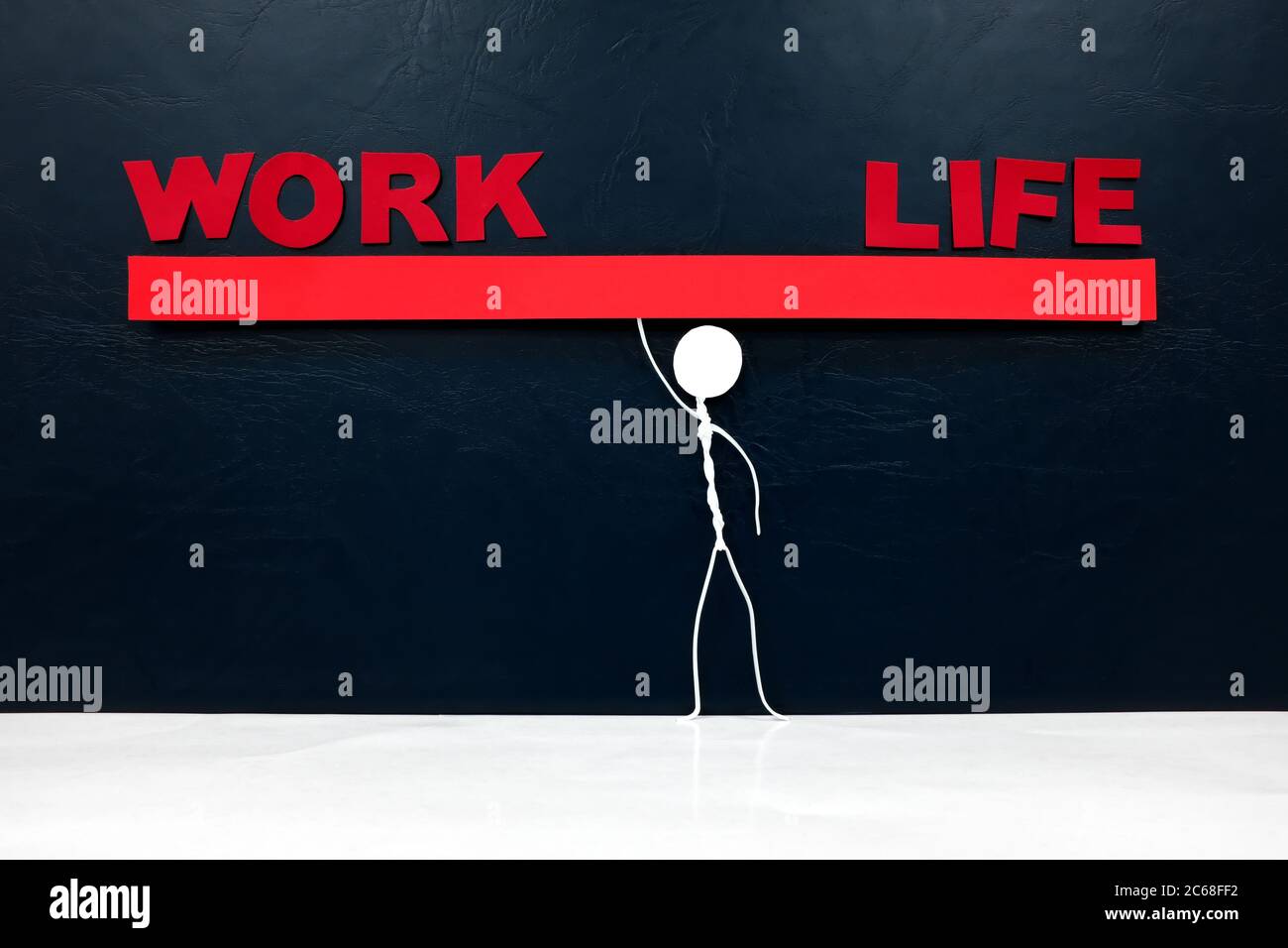Work-life balance concept. Human stick figure balancing a red seesaw ...