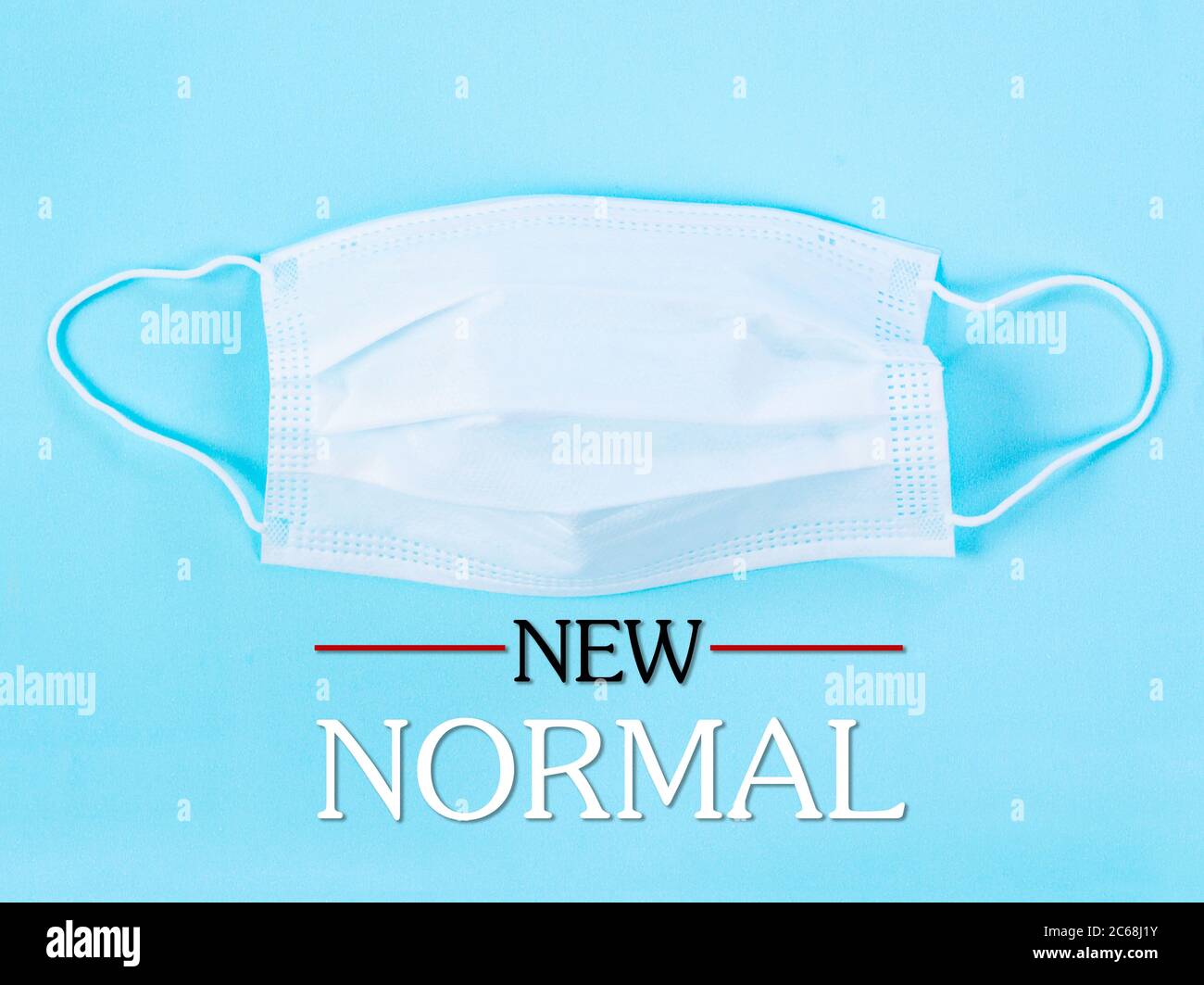 NEW NORMAL word with surgical medical face mask. Life after pandemic ...