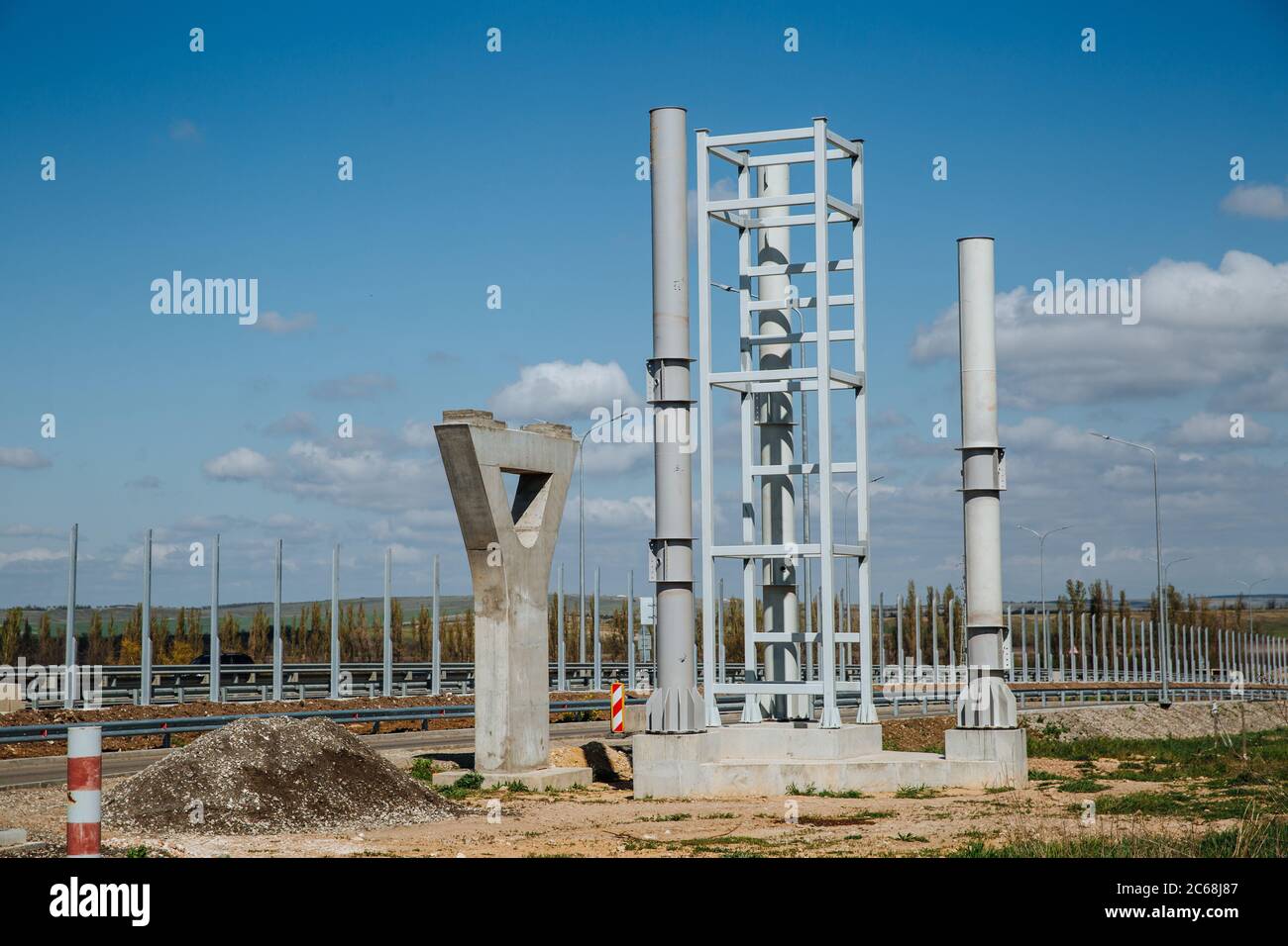 Supports are prepared for the construction of a pedestrian crossing ...