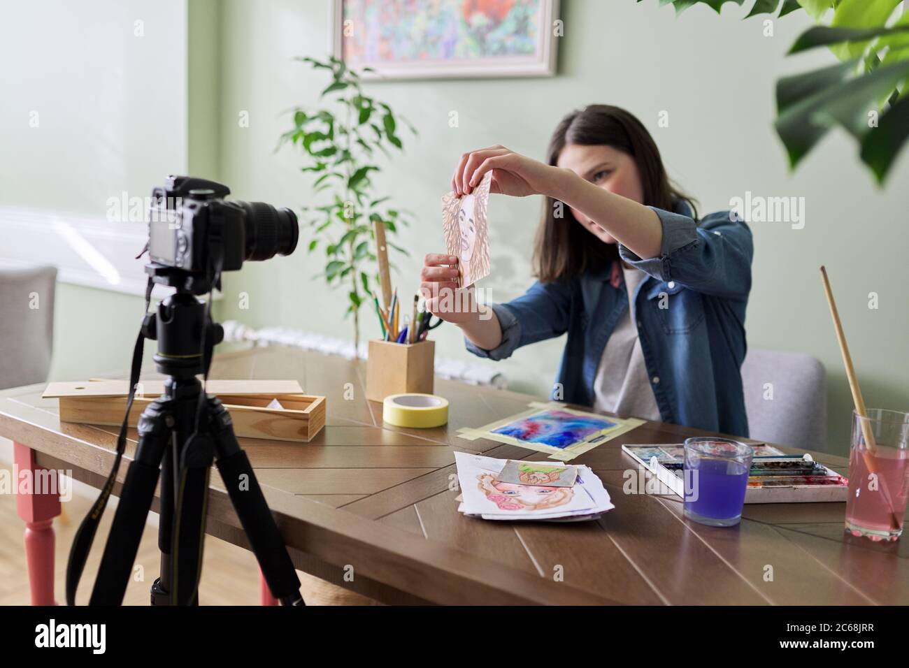 Creative girl teenager artist painting in watercolor Stock Photo - Alamy