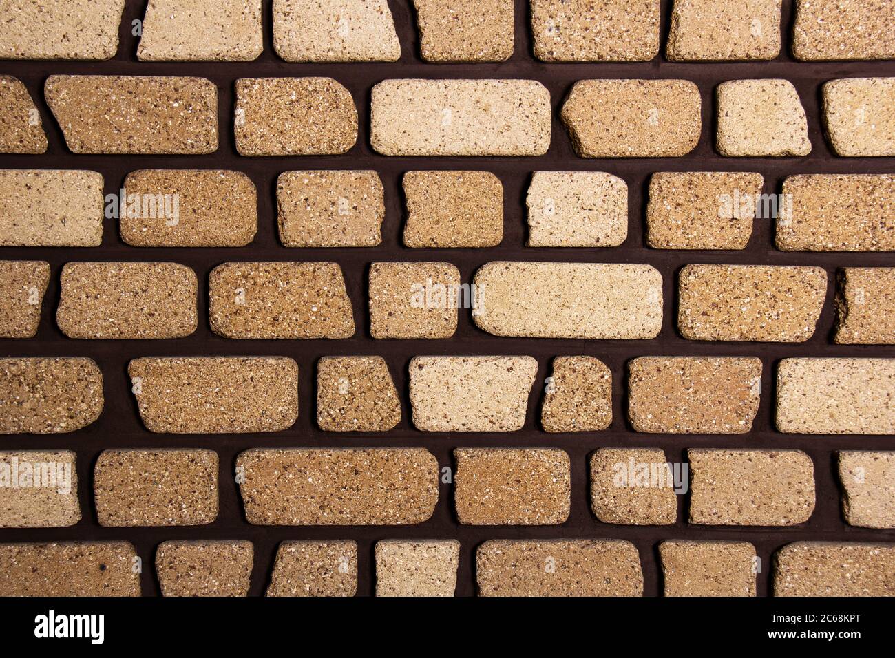 Arrange the bricks side by side - on a wall. The front of the brick ...