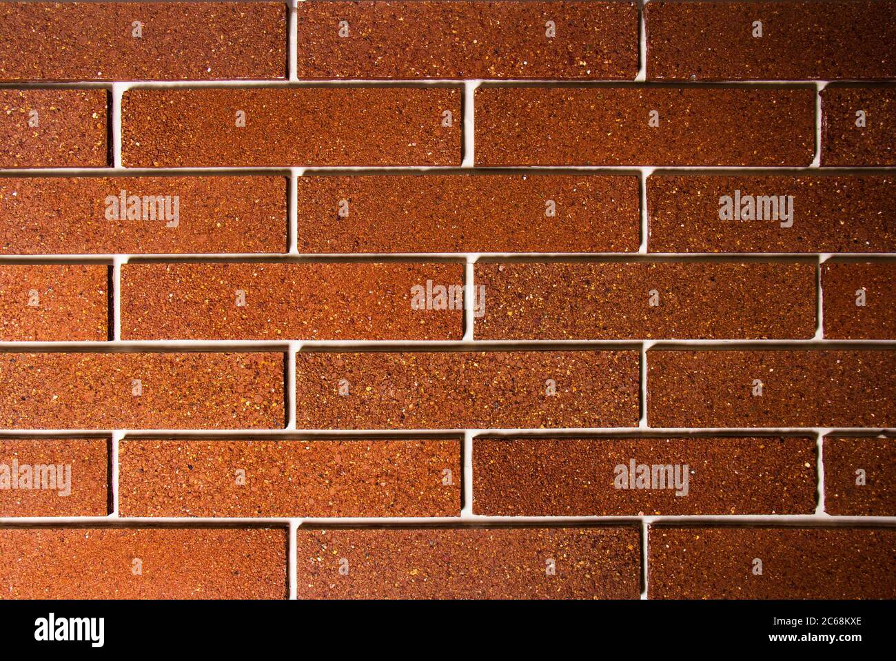 Arrange the bricks side by side - on a wall. The front of the brick ...