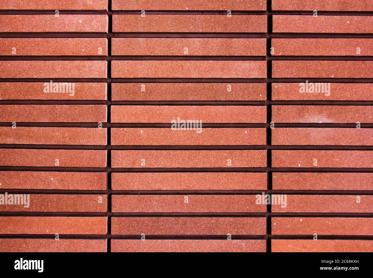 Arrange the bricks side by side - on a wall. The front of the brick ...