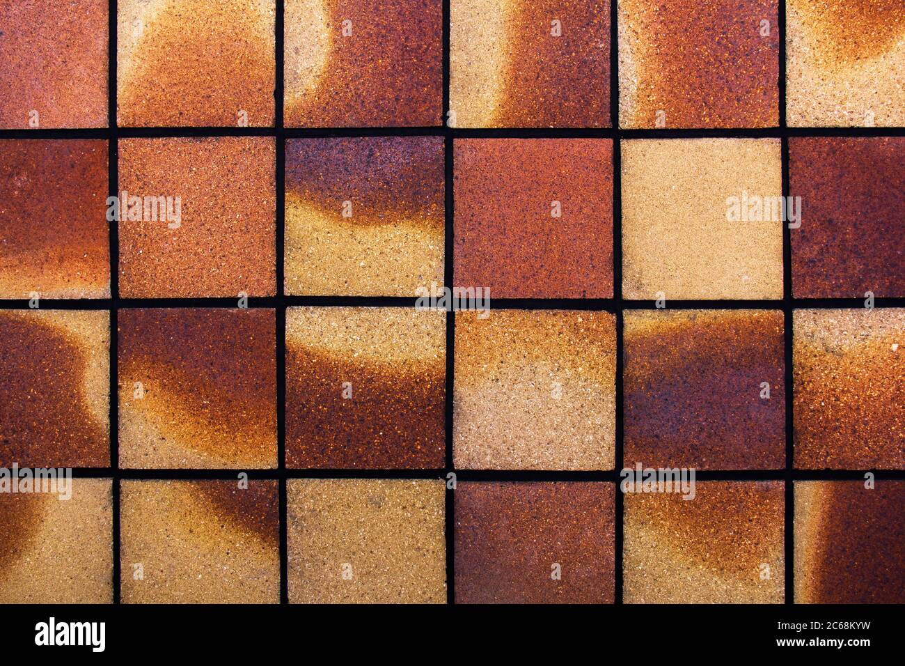 Square layout of bricks side by side - on a wall. The front of the ...