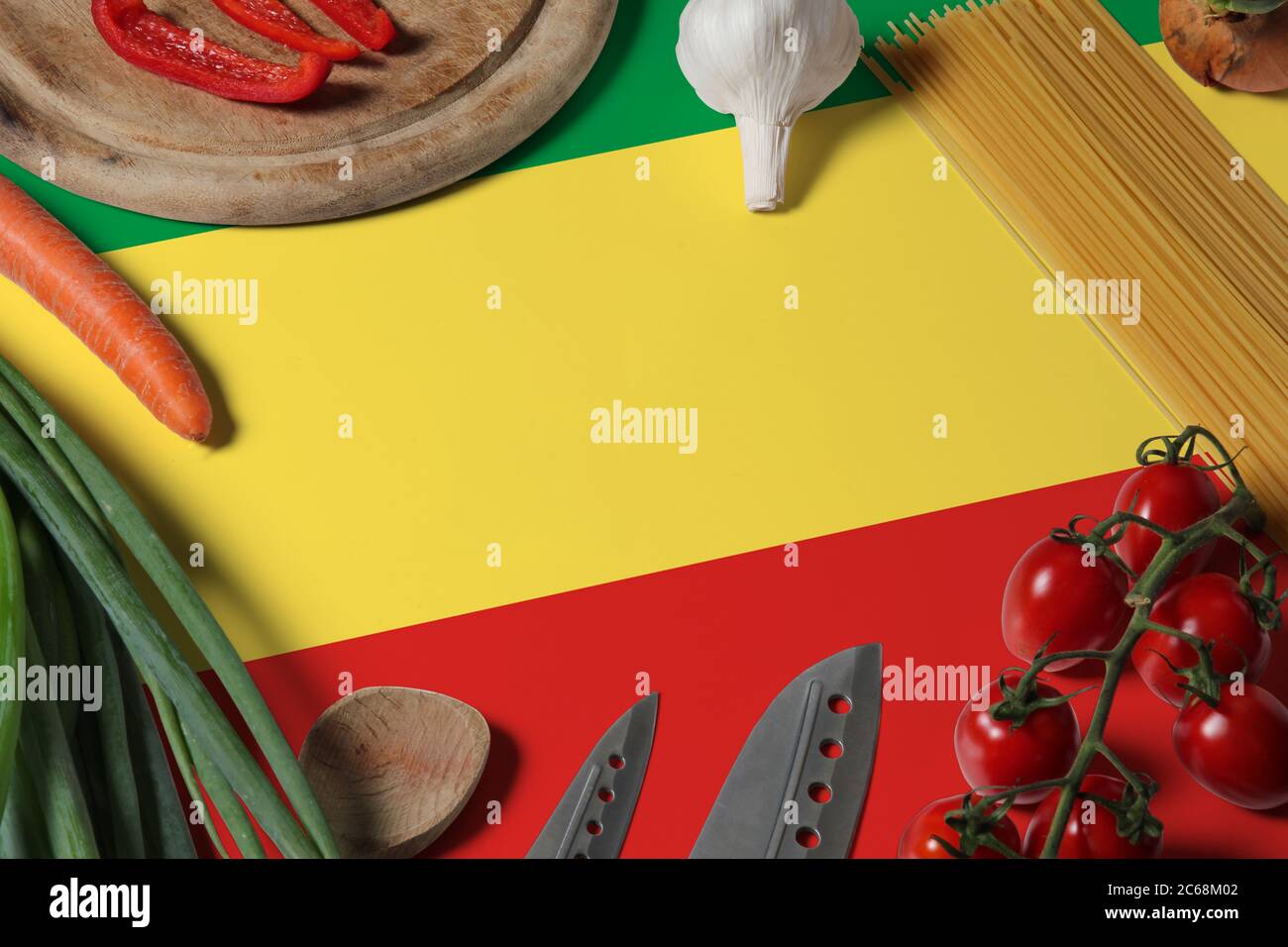 Republic Of The Congo flag on fresh vegetables and knife concept wooden ...